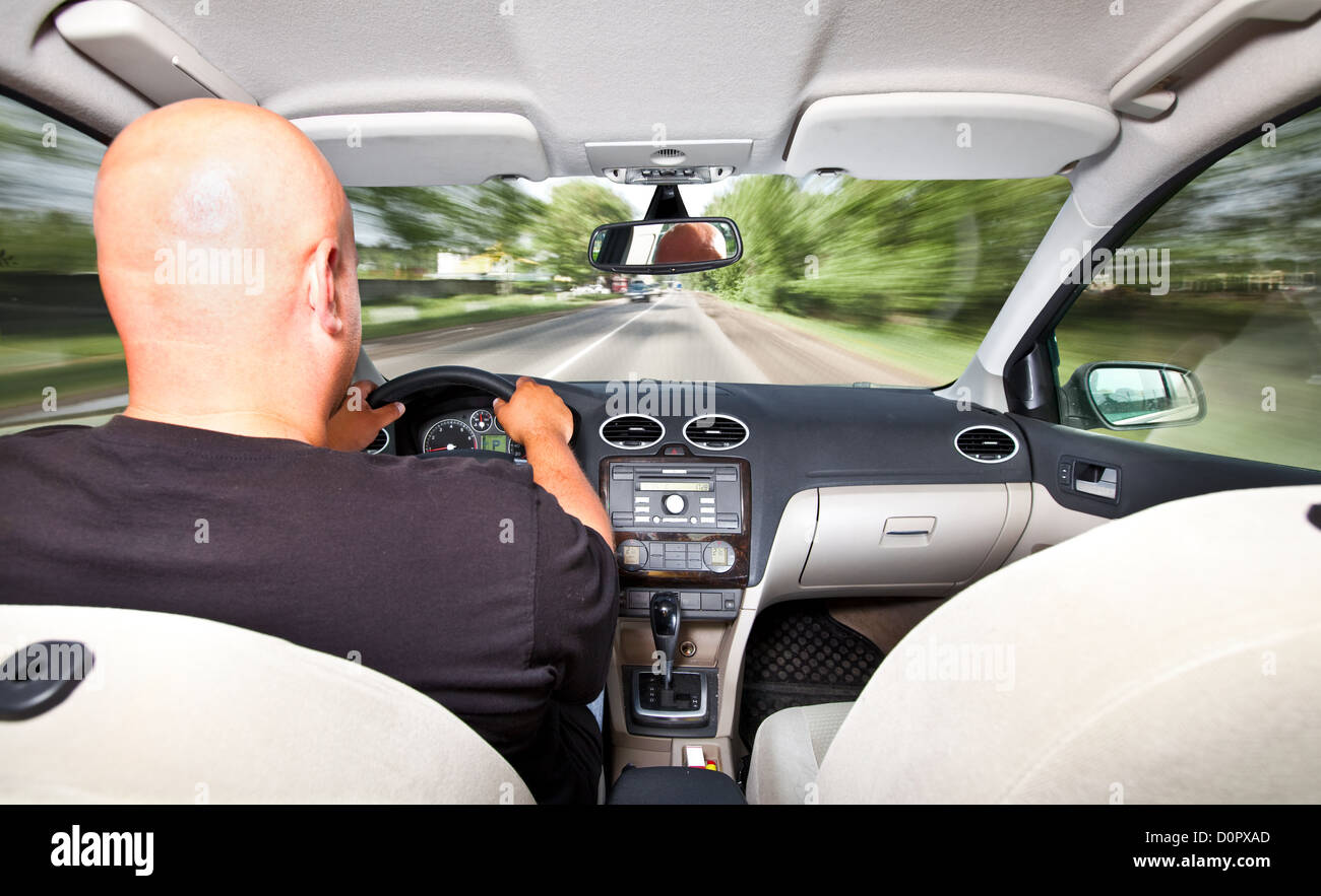 Driving a car Stock Photo - Alamy