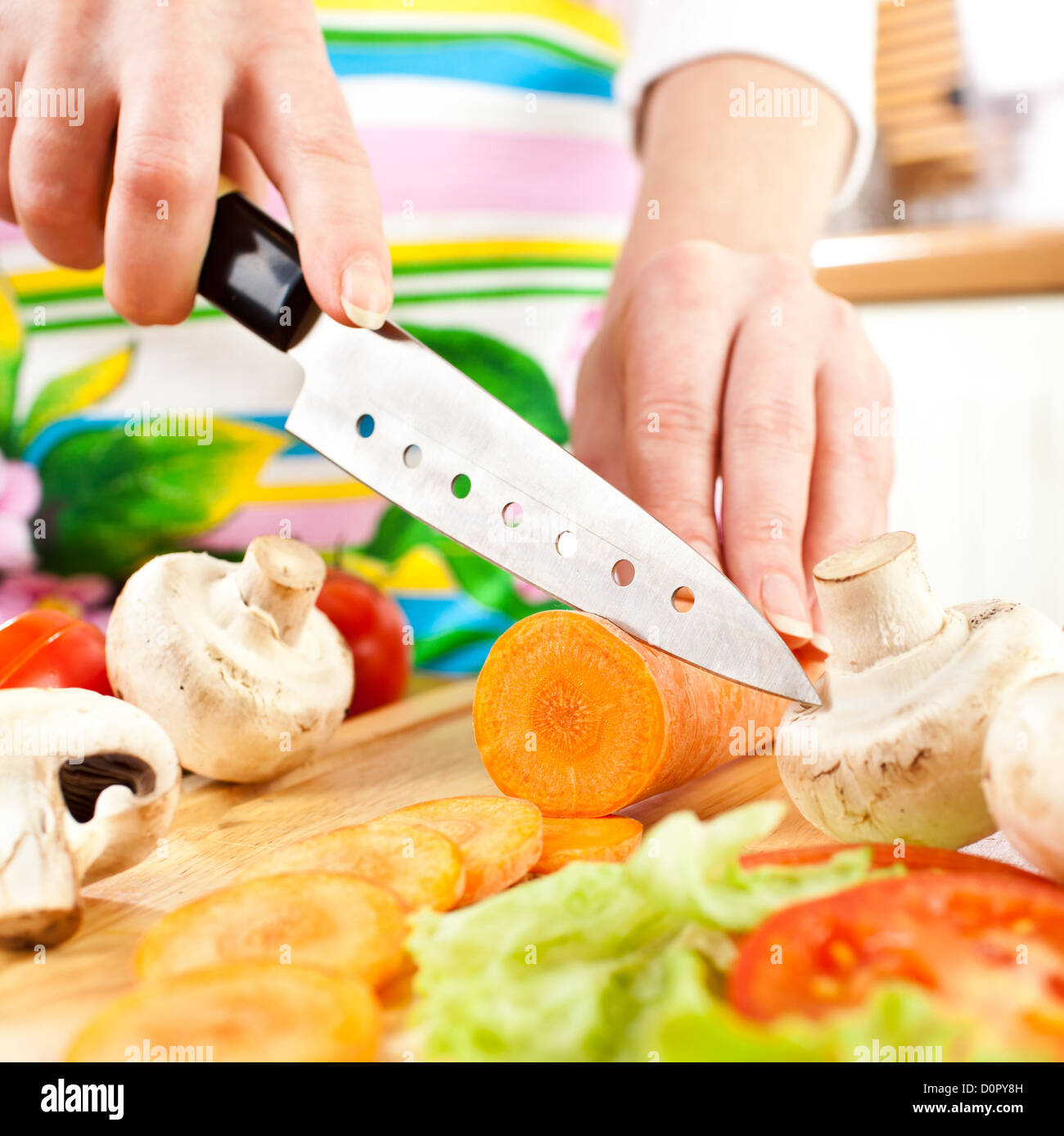 Woman's hands cutting vegetables Stock Photo - Alamy