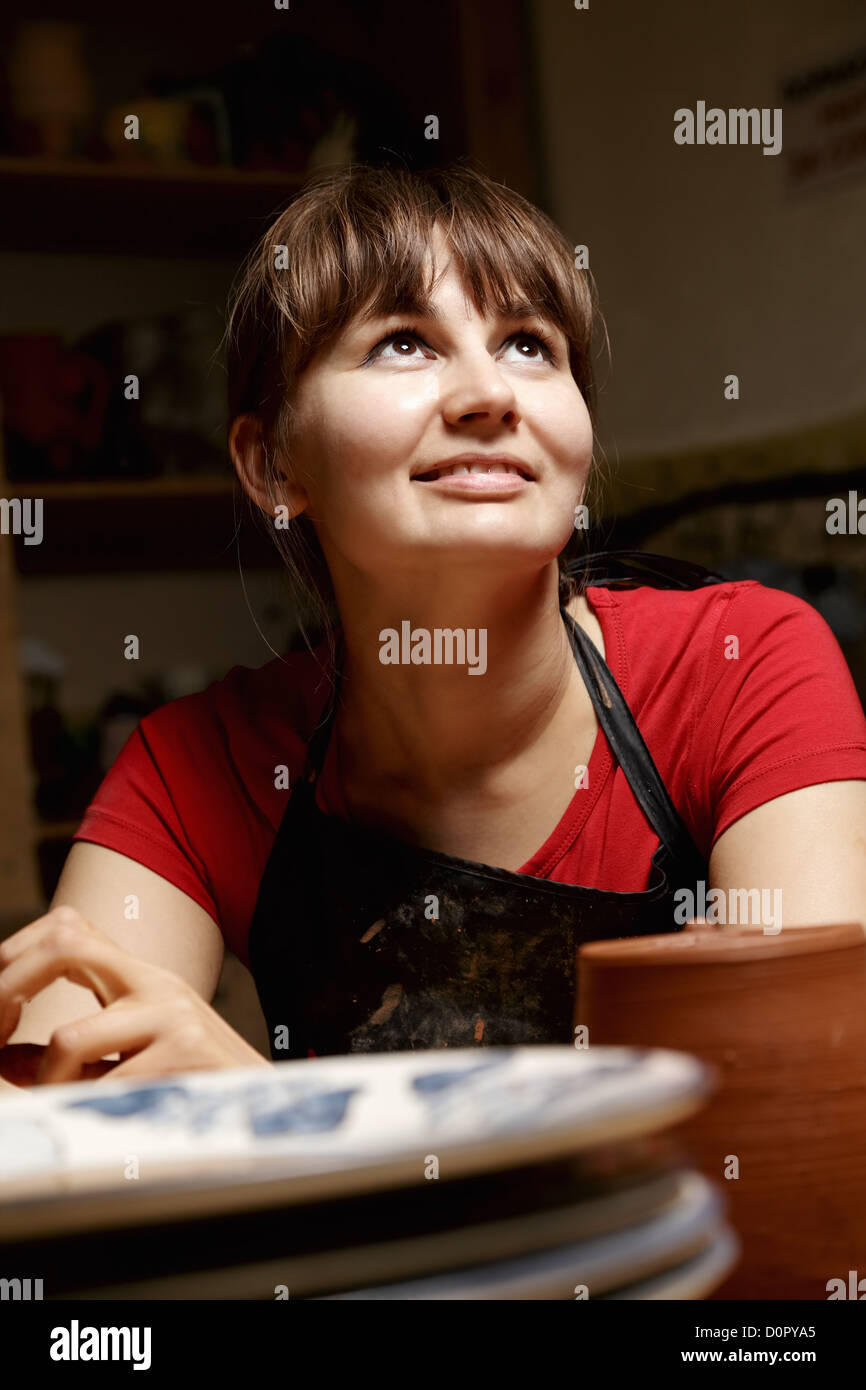 Positive craftsman in apron hi-res stock photography and images - Alamy