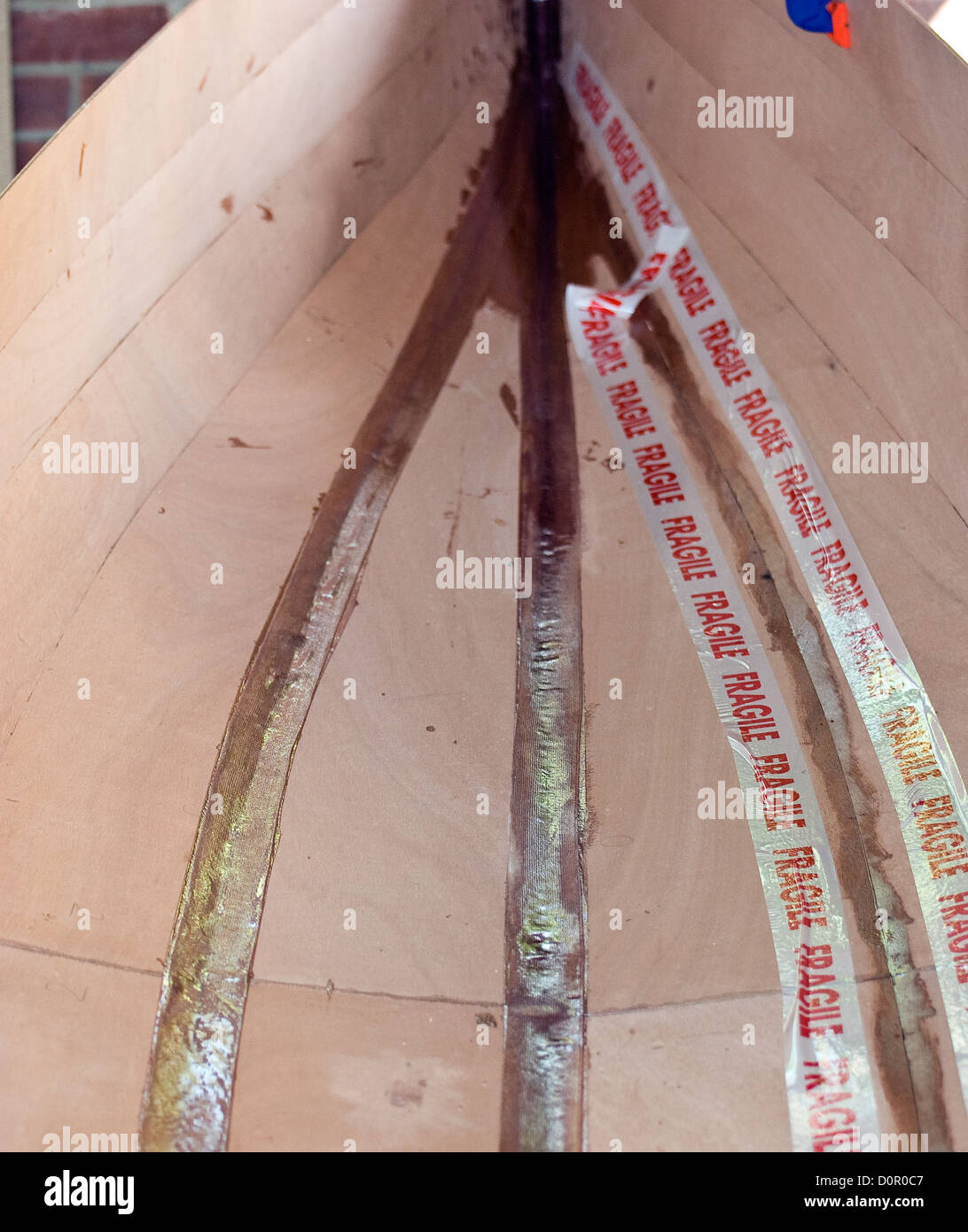 canoe build Stitch-and-glue construction stages of build Stock Photo ...