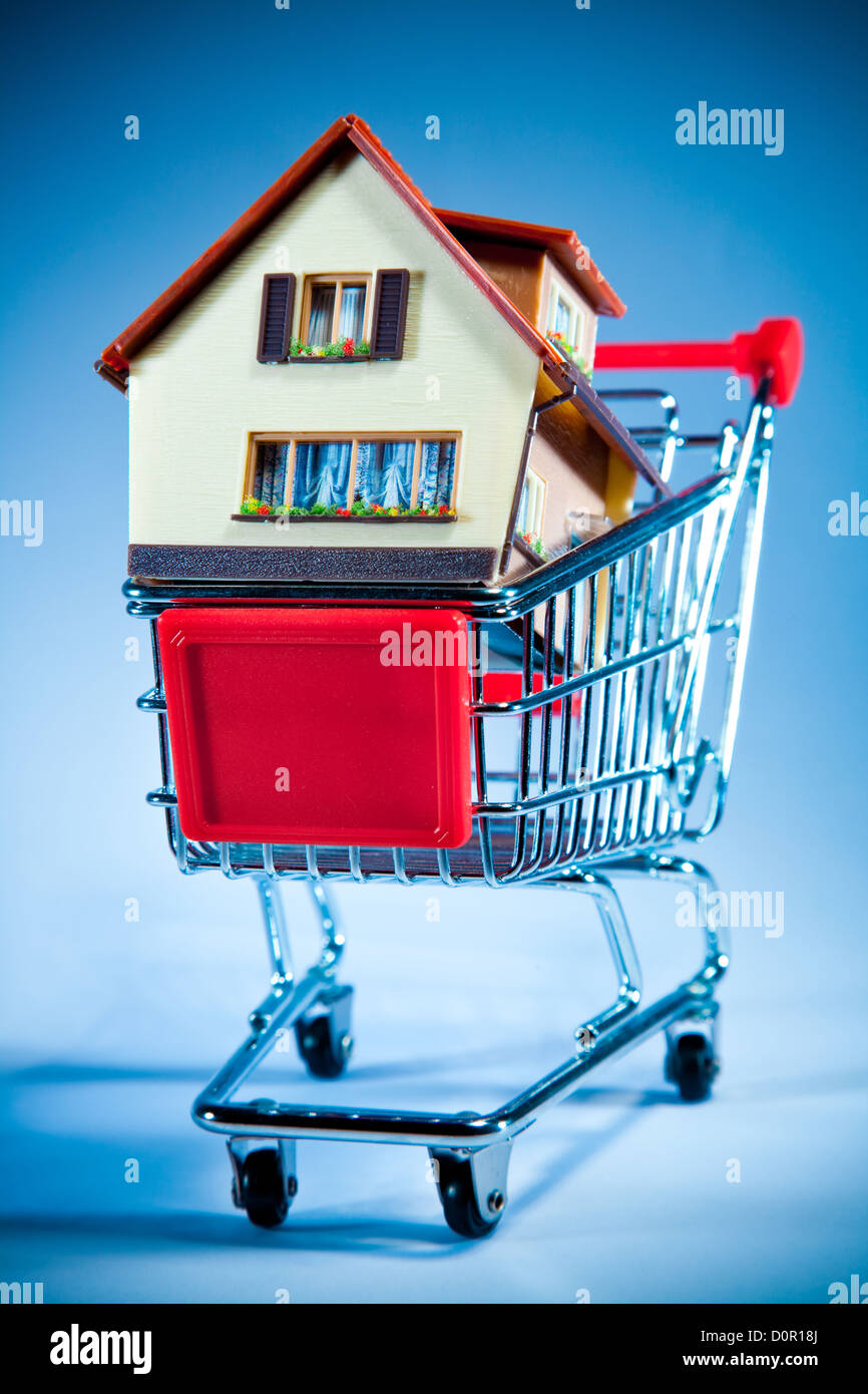 shopping cart and house Stock Photo - Alamy