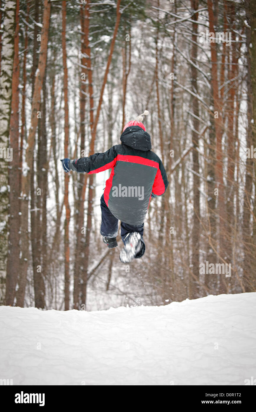 Jump over snow hill Stock Photo - Alamy
