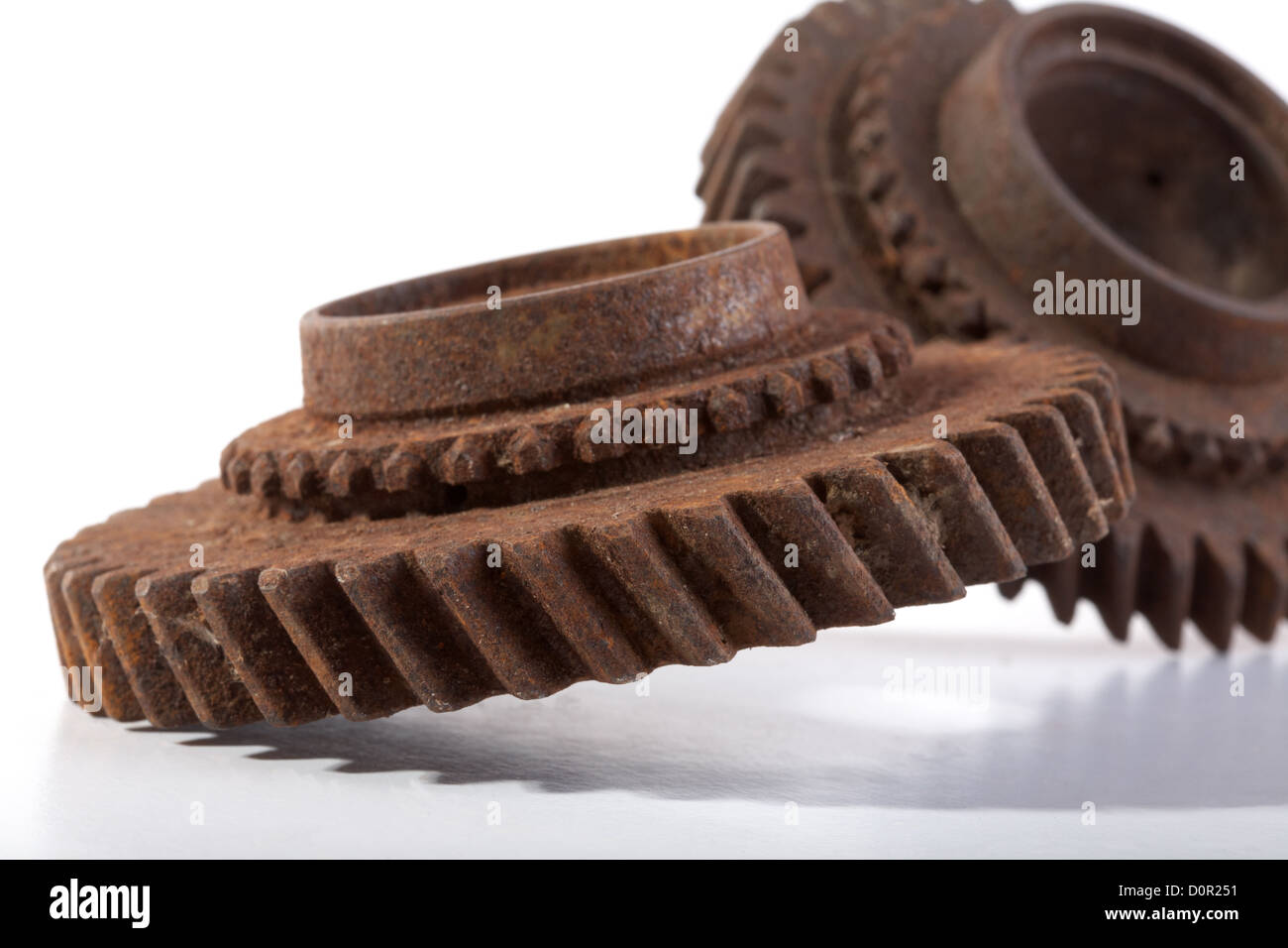Rusty gears on a white background Stock Photo - Alamy