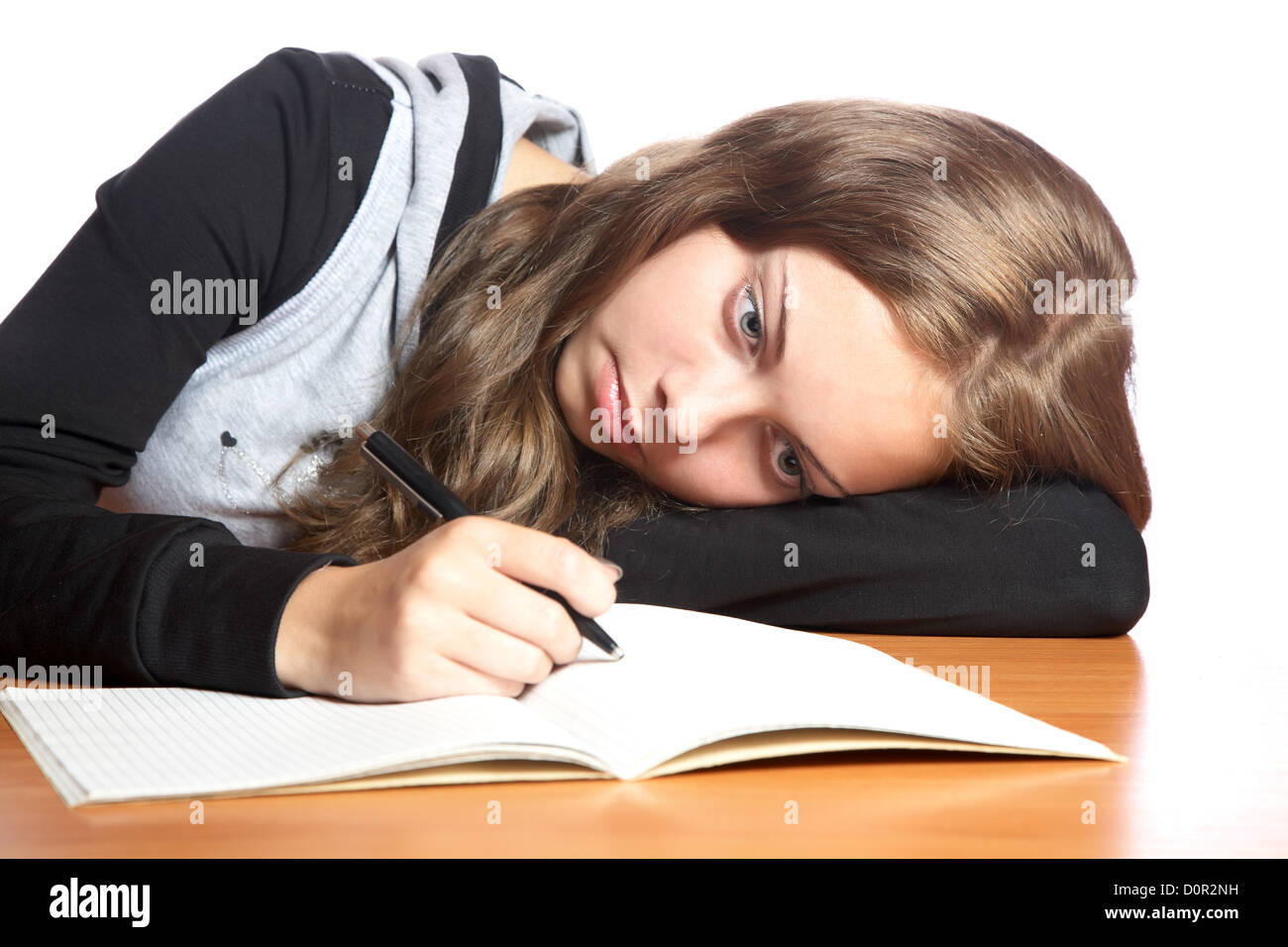 Schoolgirl standing writing in hi-res stock photography and images - Alamy