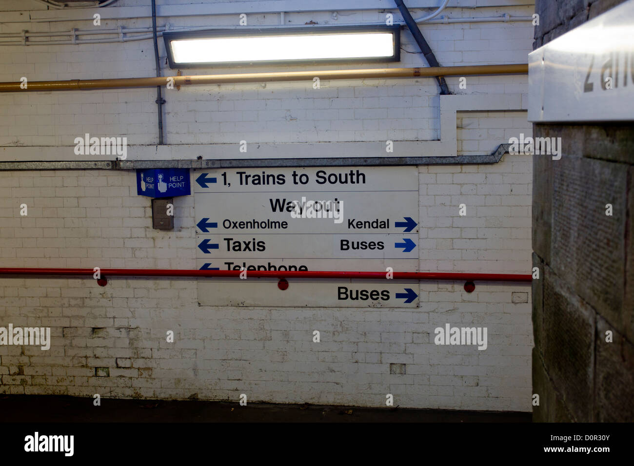 Signs at Oxenholme railway station in underpass passenger tunnel Stock ...