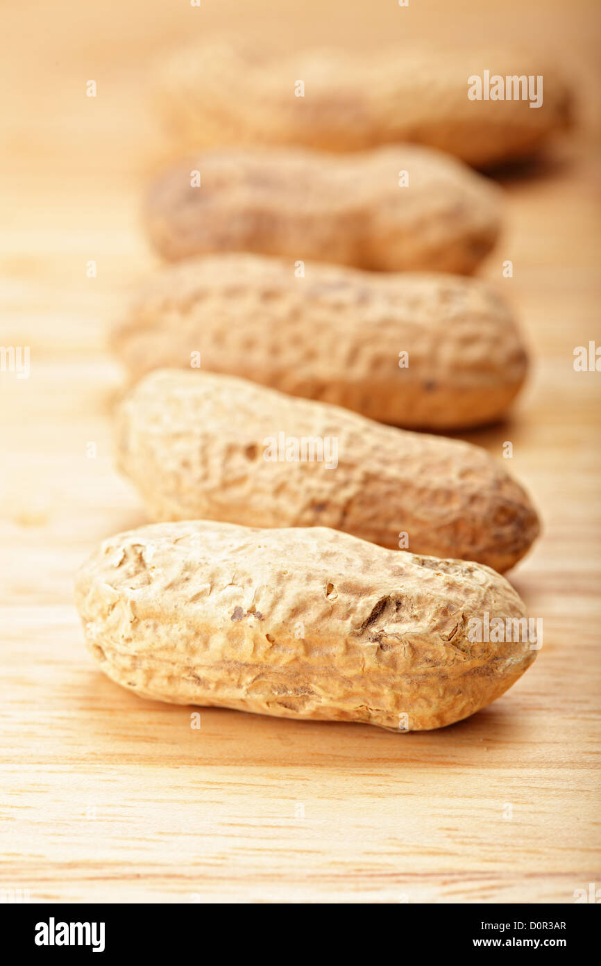 Row of peanuts in shells Stock Photo - Alamy