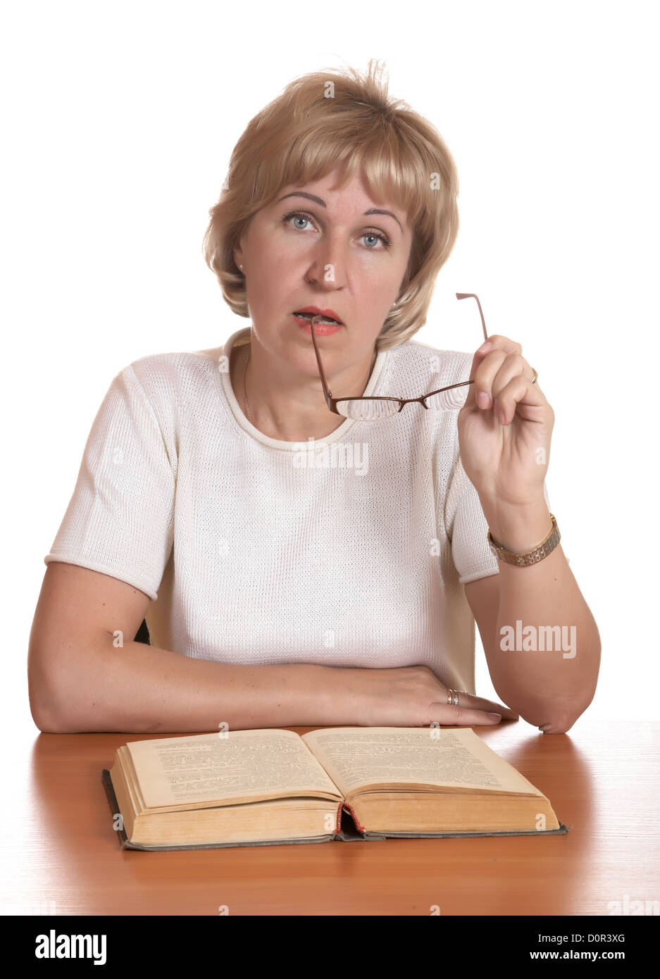 Woman behind a book hi-res stock photography and images - Alamy