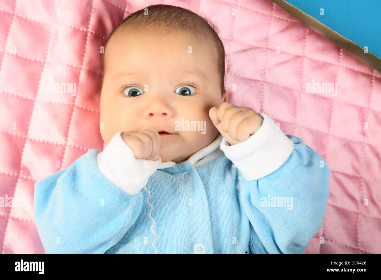 The small child having shrink cams lies Stock Photo - Alamy