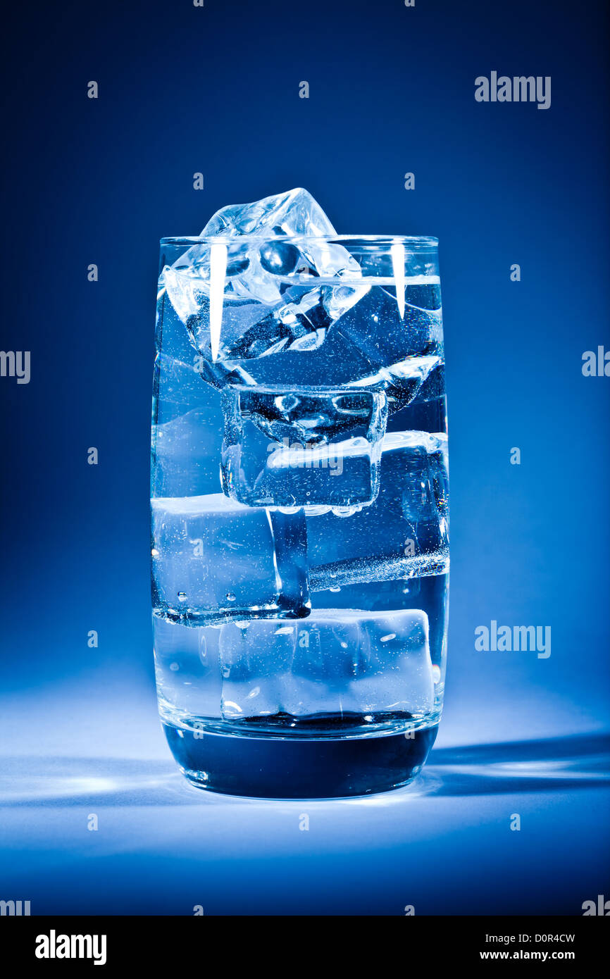 Glass of water with ice Stock Photo - Alamy