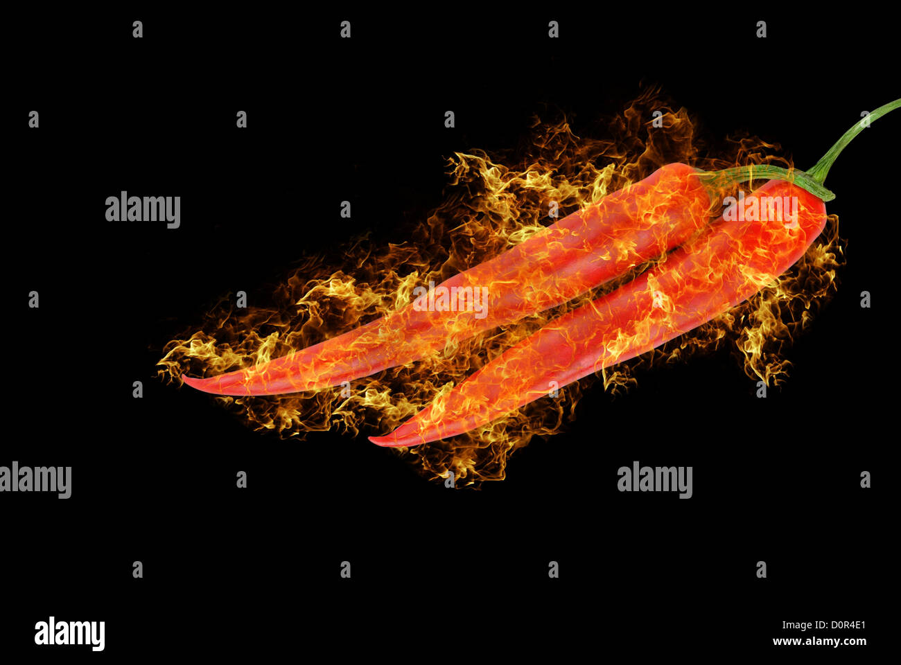 spicy red chilli peppers at fire Stock Photo - Alamy