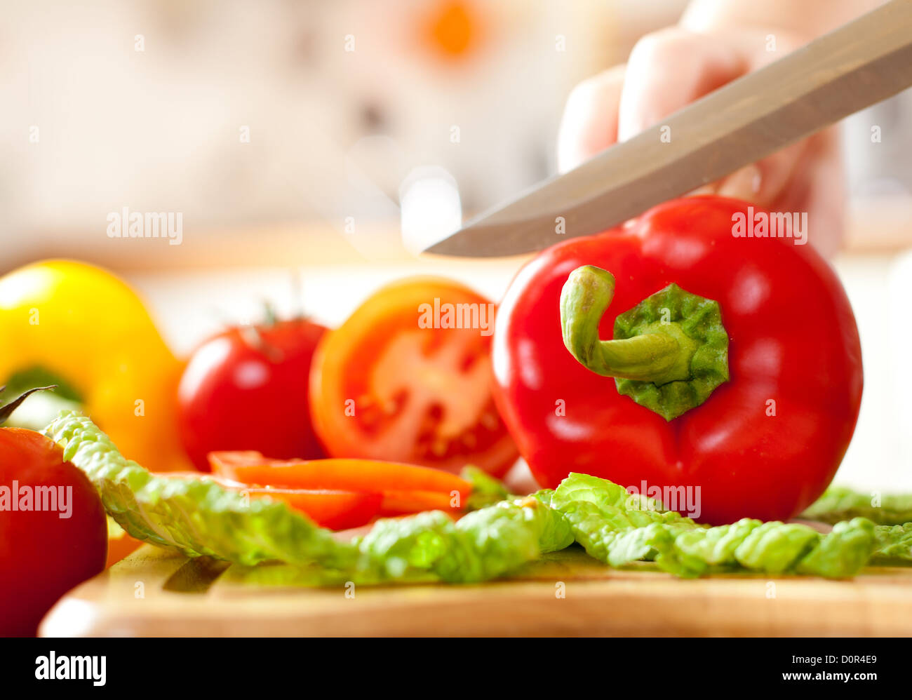 Woman's hands cutting vegetables Stock Photo - Alamy