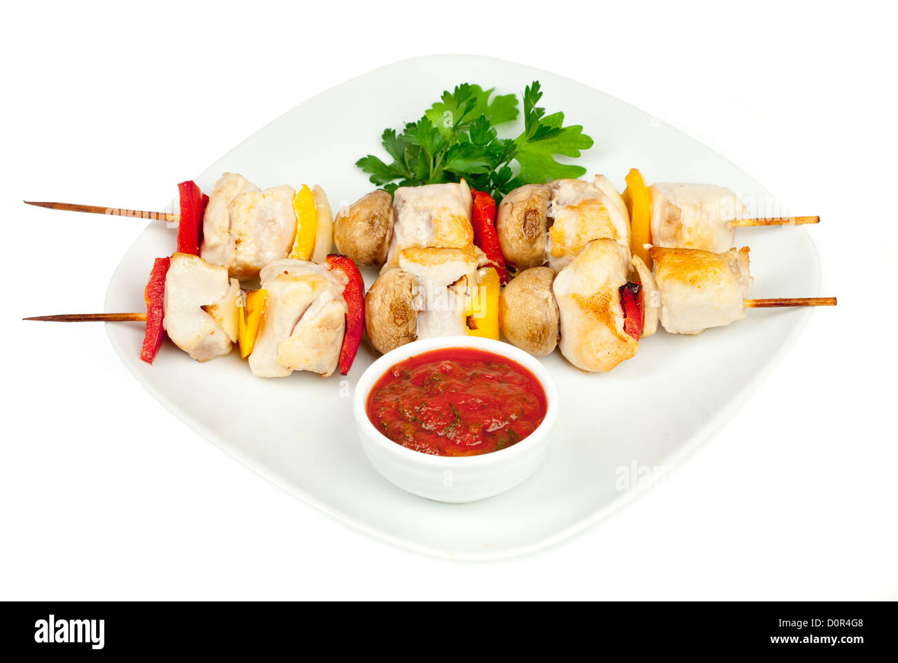 Fried pieces of a hen with sauce Stock Photo - Alamy