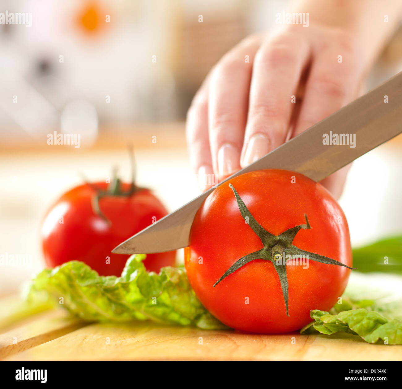 Woman's hands cutting vegetables Stock Photo - Alamy