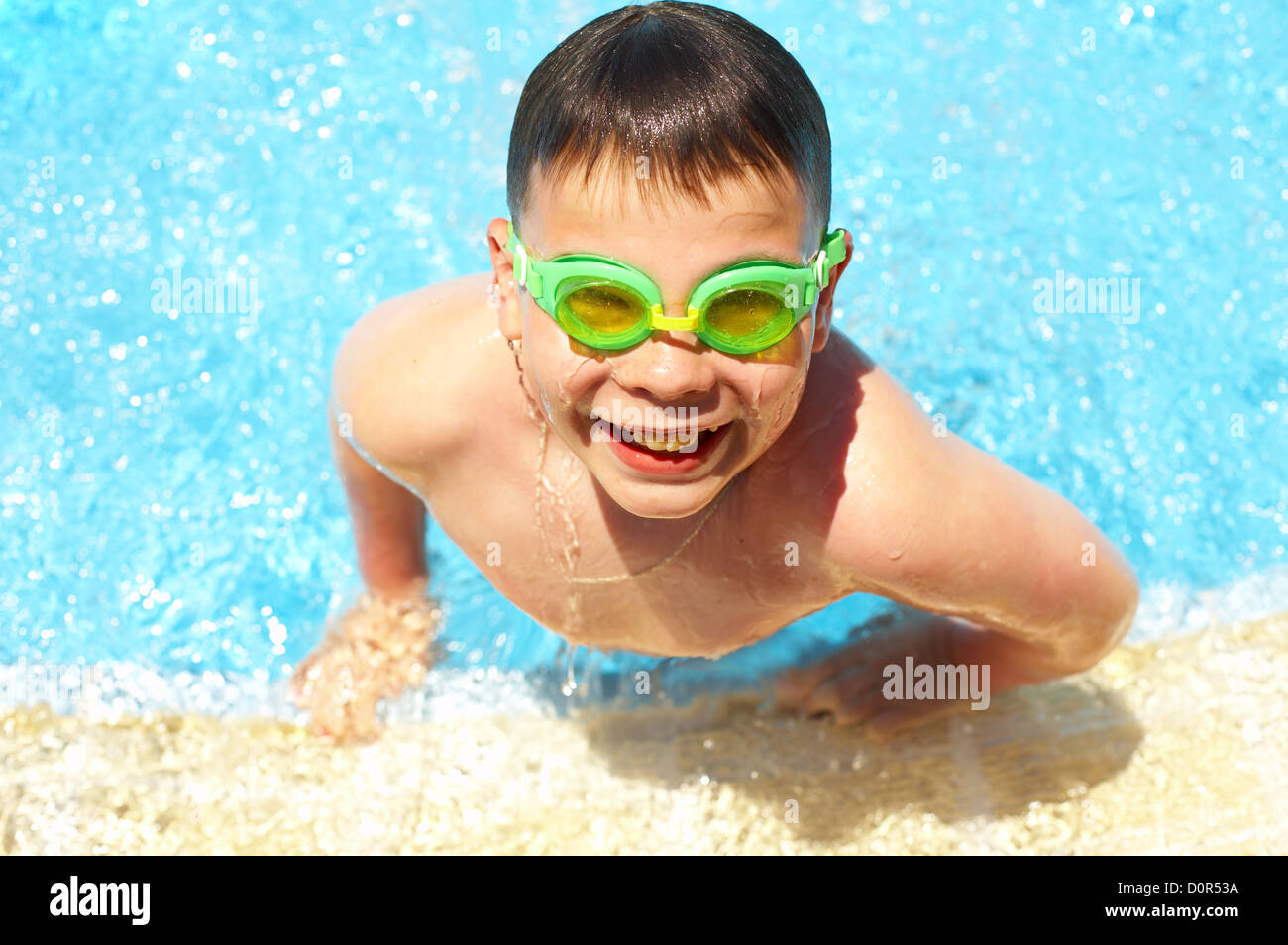 Boy in pool Stock Photo - Alamy