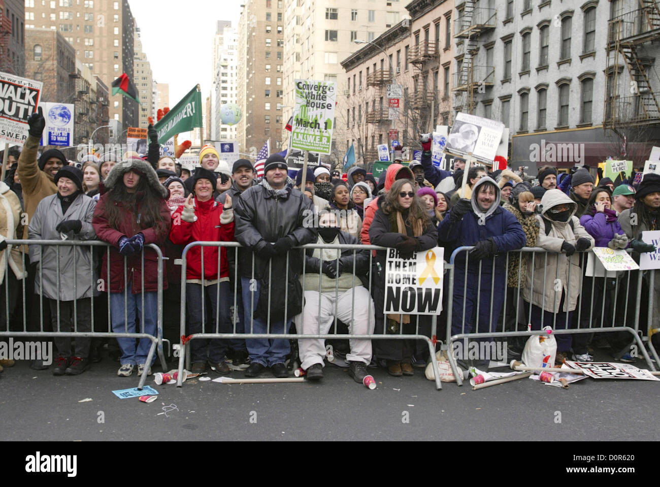 Protesters yell behind barricades in protest of the buildup for the ...