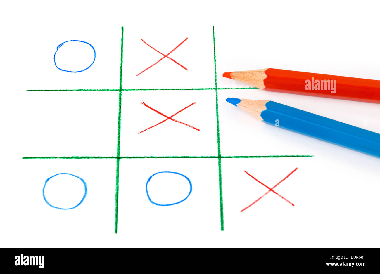 Noughts and crosses game Stock Photo - Alamy