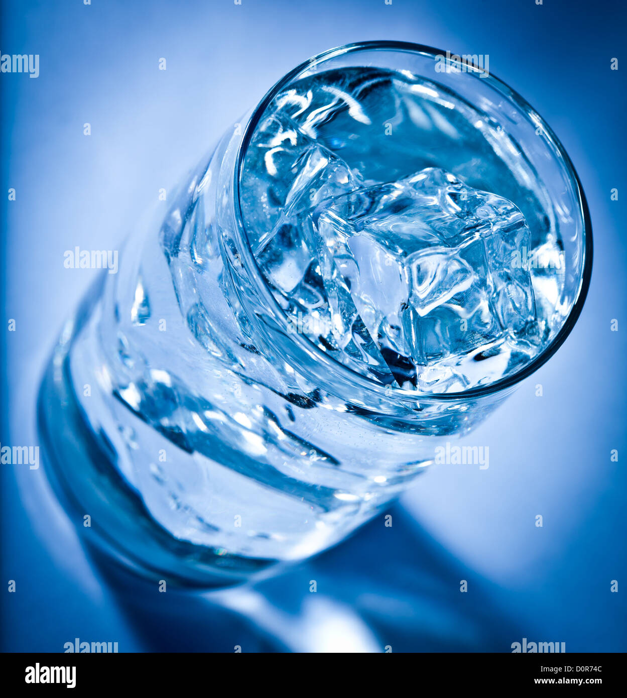Glass of water with ice Stock Photo - Alamy
