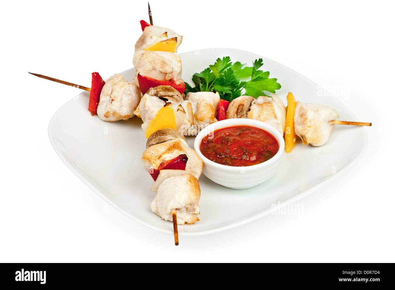 Fried pieces of a hen with sauce Stock Photo - Alamy