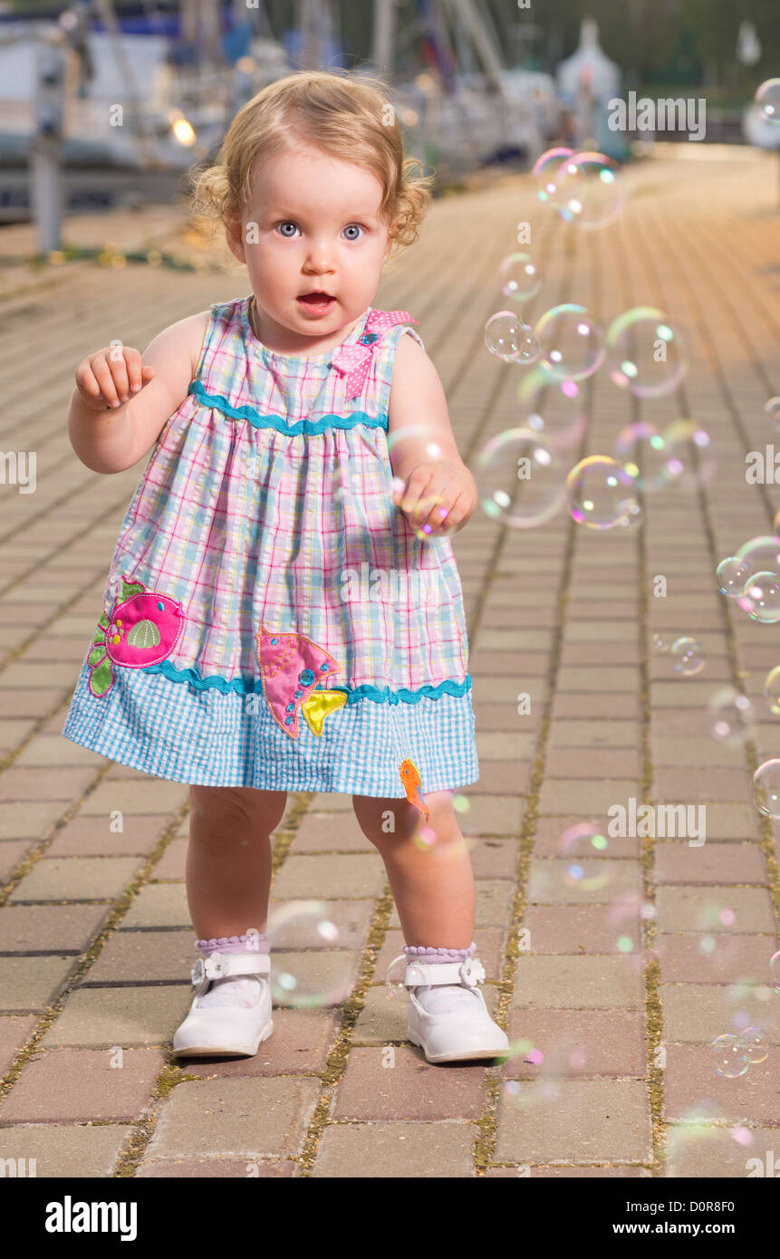 Baby with bubbles Stock Photo - Alamy