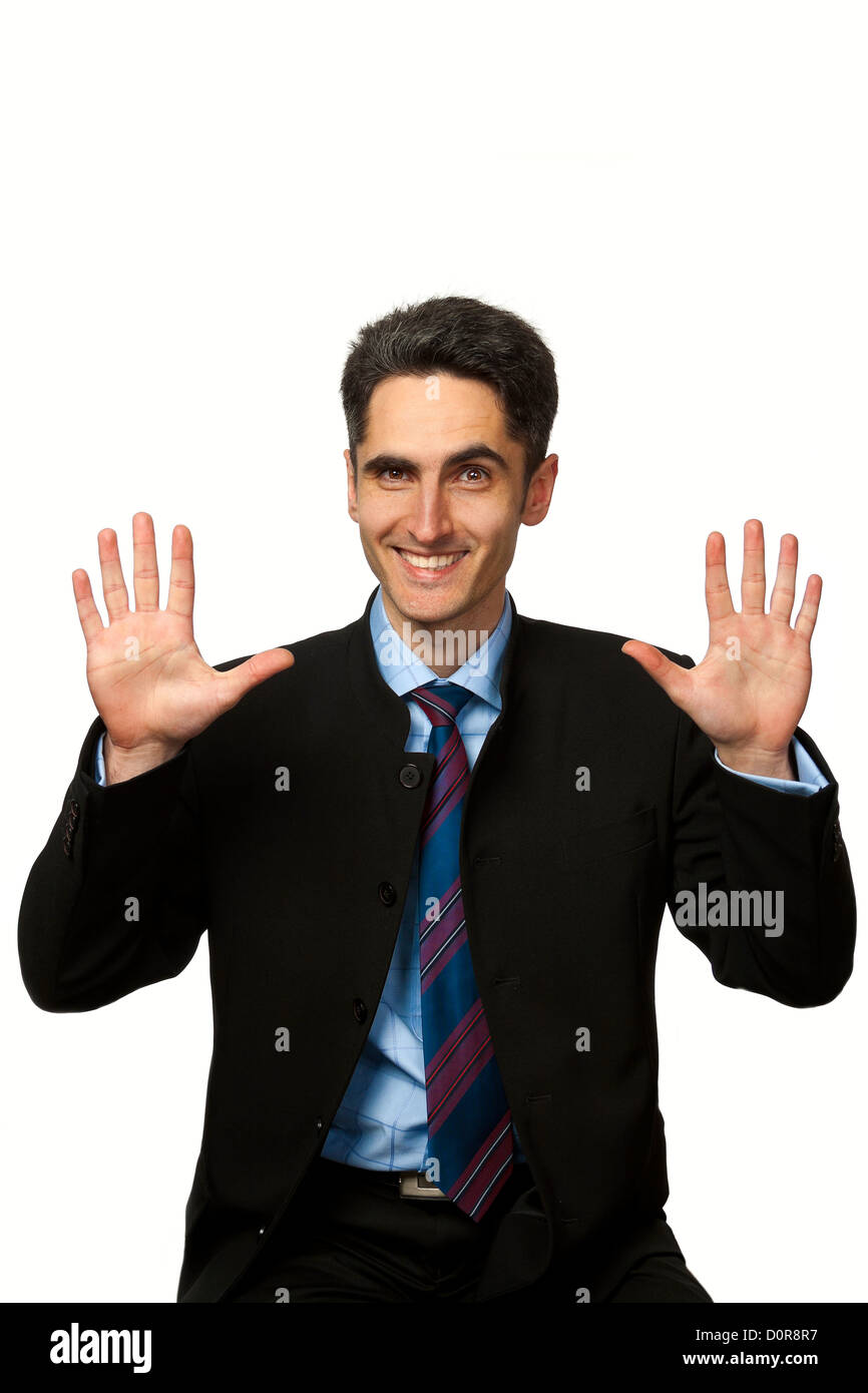 Young businessman is showing hand signs Stock Photo - Alamy