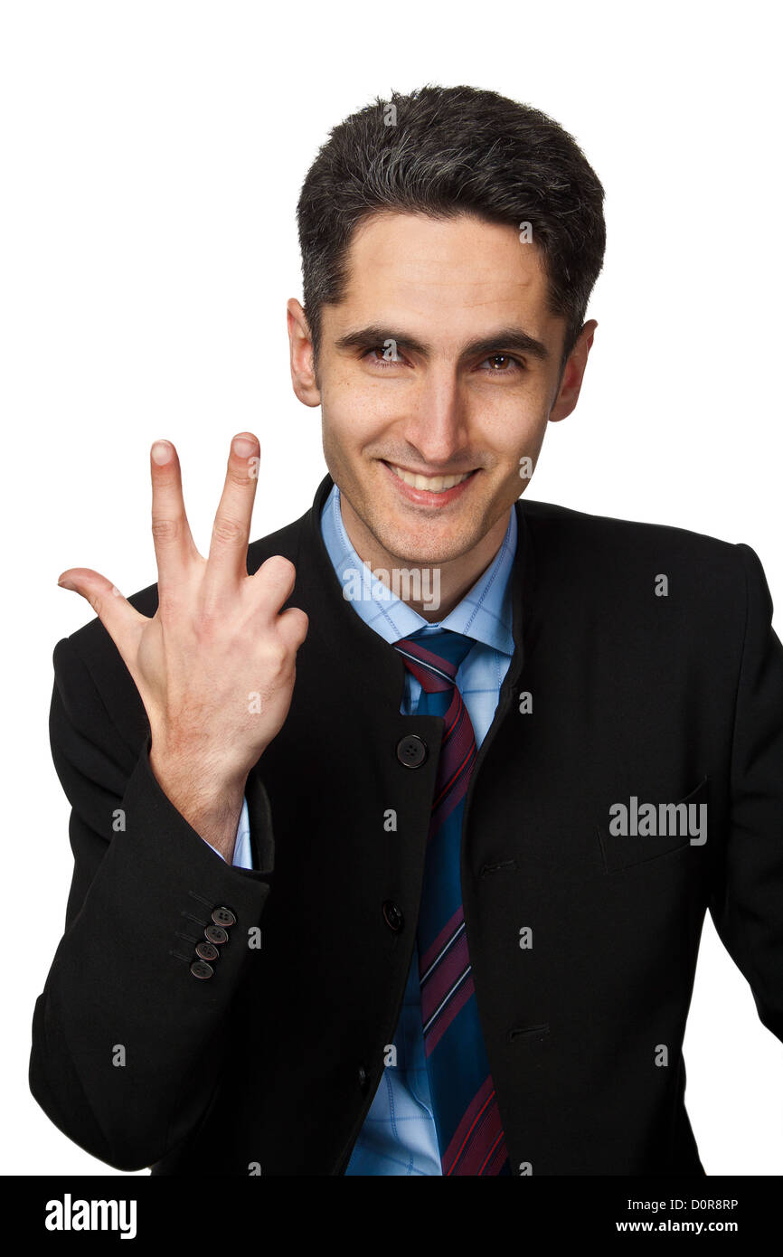 Young businessman is showing hand signs Stock Photo - Alamy