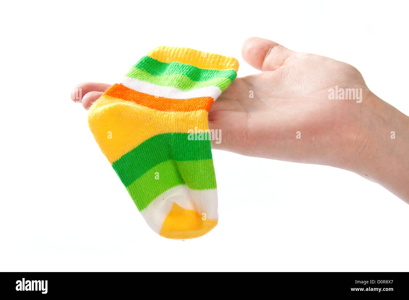 One baby sock in woman's hand Stock Photo - Alamy
