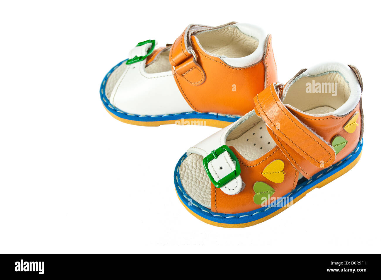 Pair of babies shoes from natural leather Stock Photo - Alamy