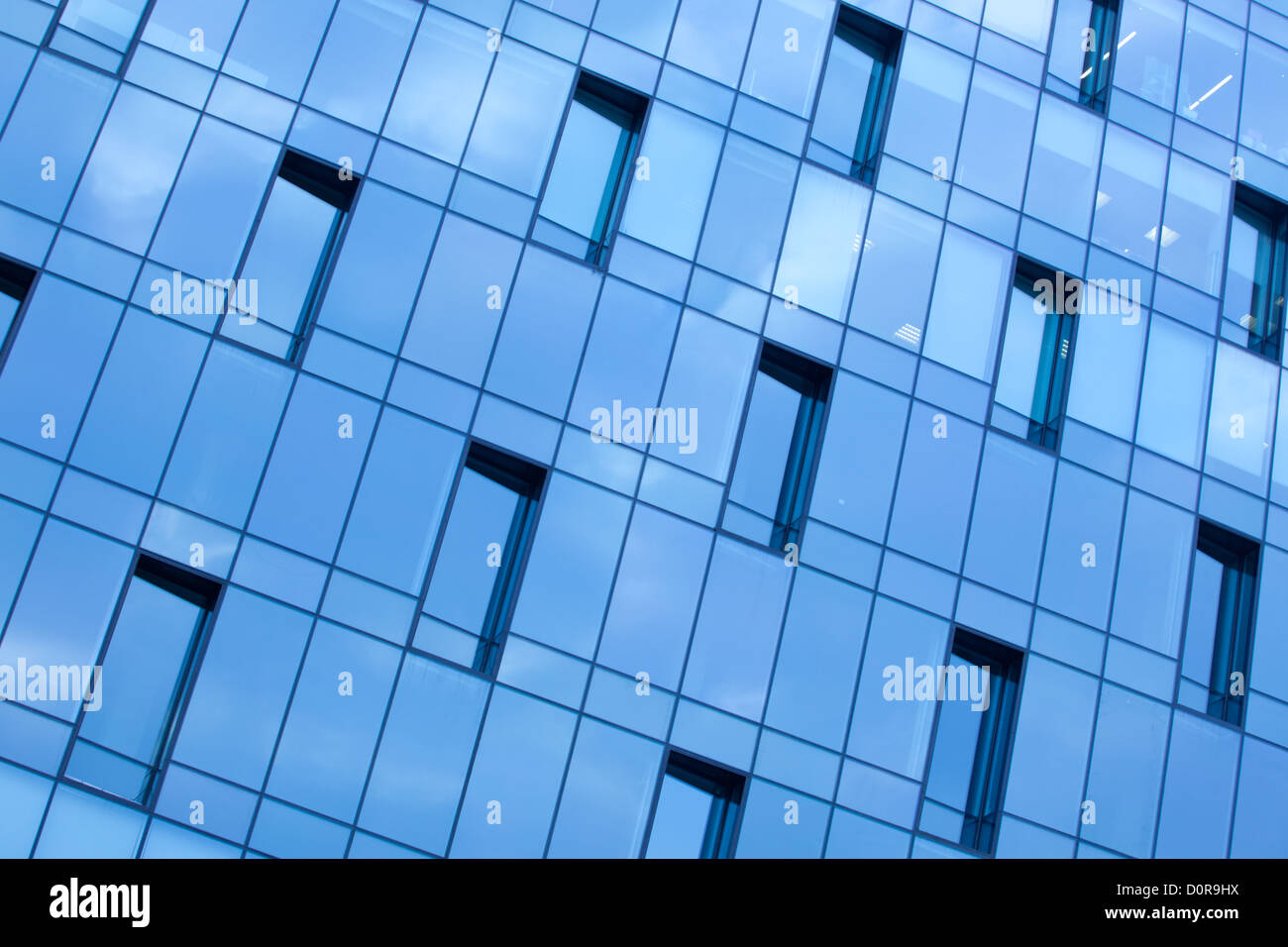 blue glass wall office building Stock Photo - Alamy