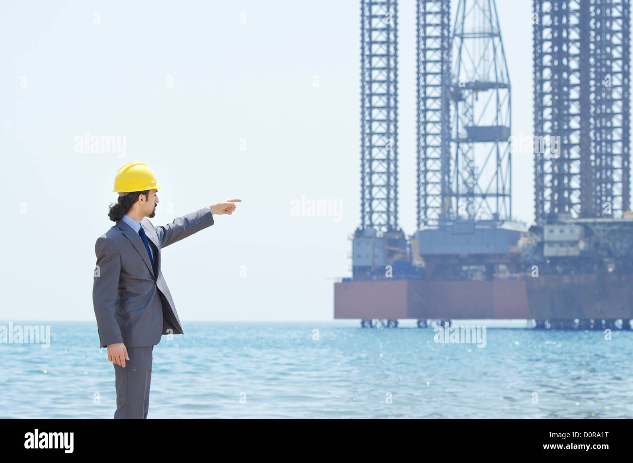 Oil engineer on sea side beach Stock Photo - Alamy