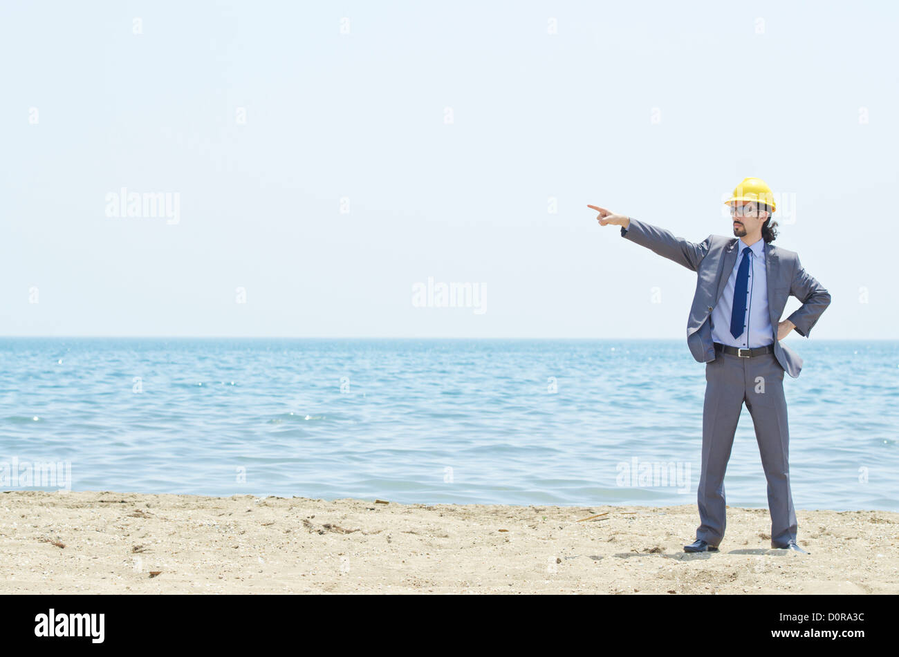 Oil engineer on sea side beach Stock Photo - Alamy