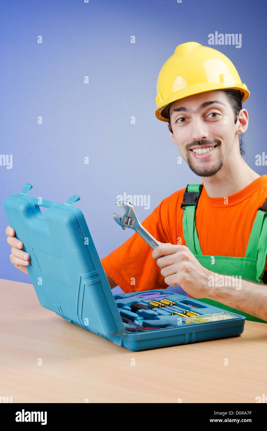 Repairman with his toolkit Stock Photo - Alamy