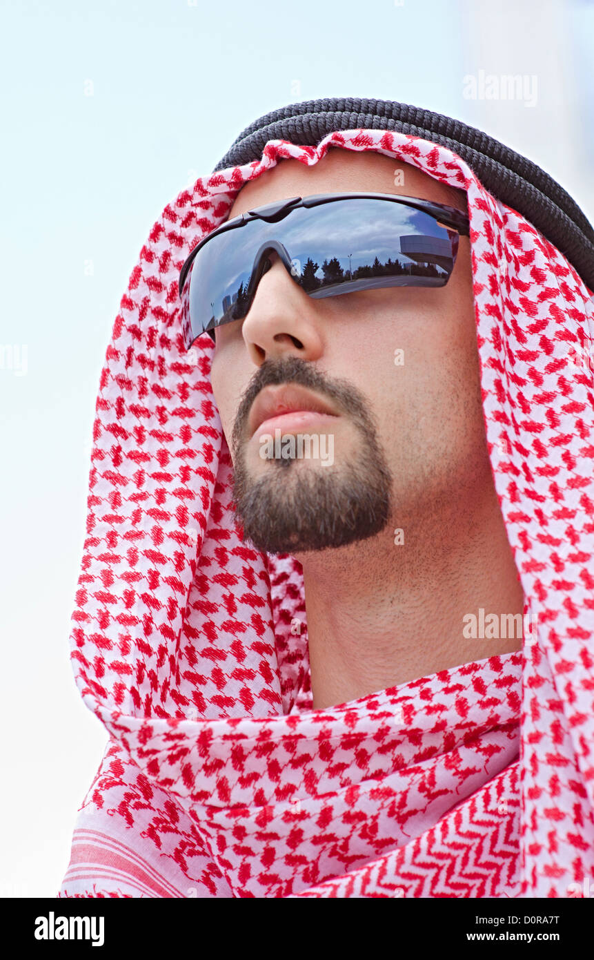 Arab on the street in summer Stock Photo - Alamy