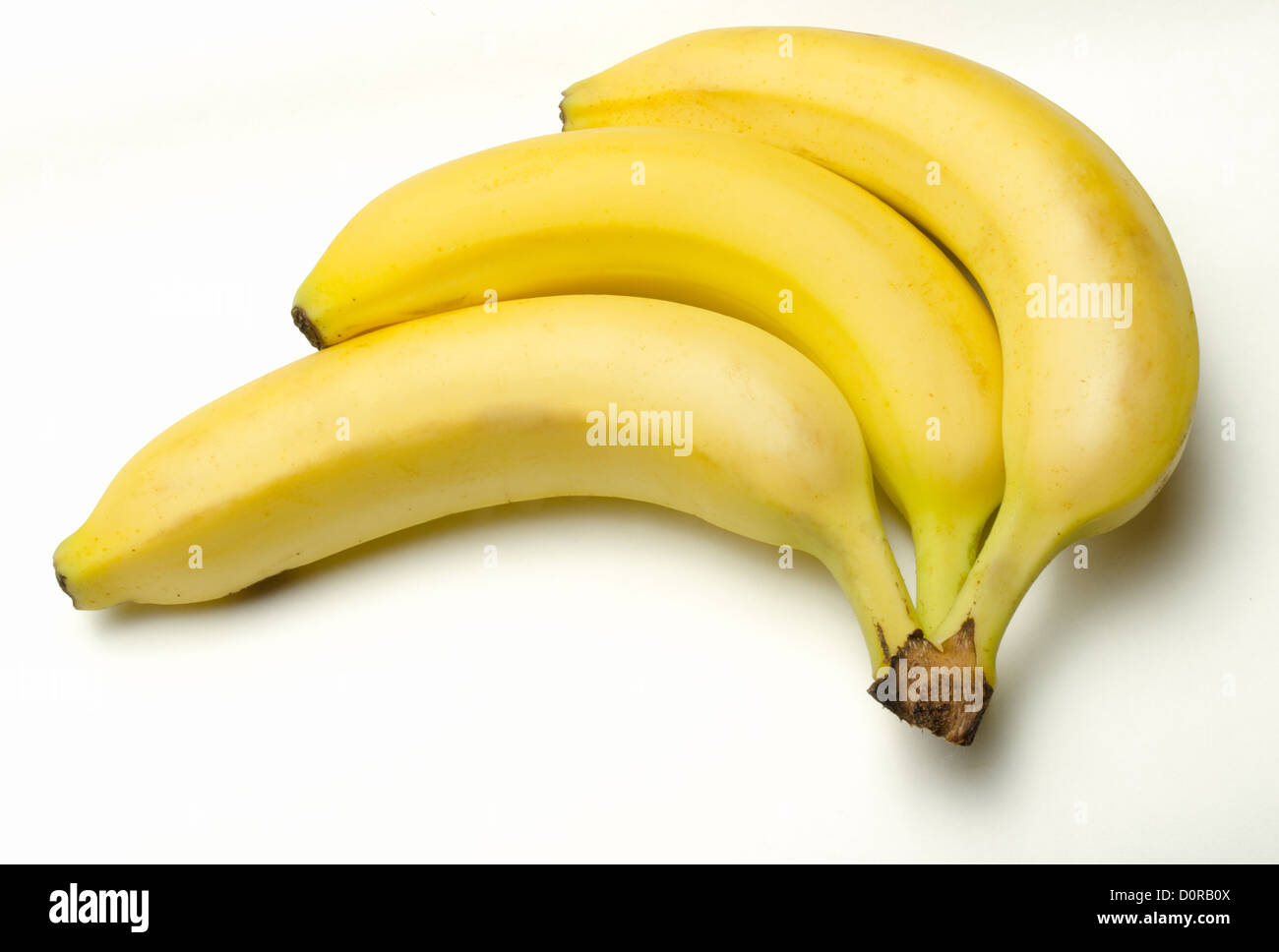 A bunch of 3 Bananas on isolated white background Stock Photo - Alamy