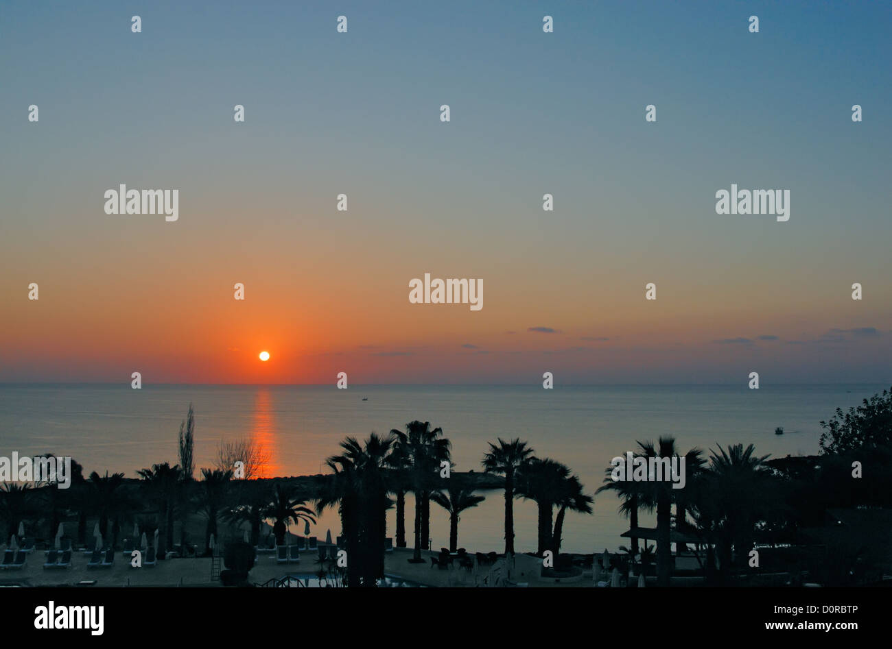Sunset On Beach Stock Photo - Alamy