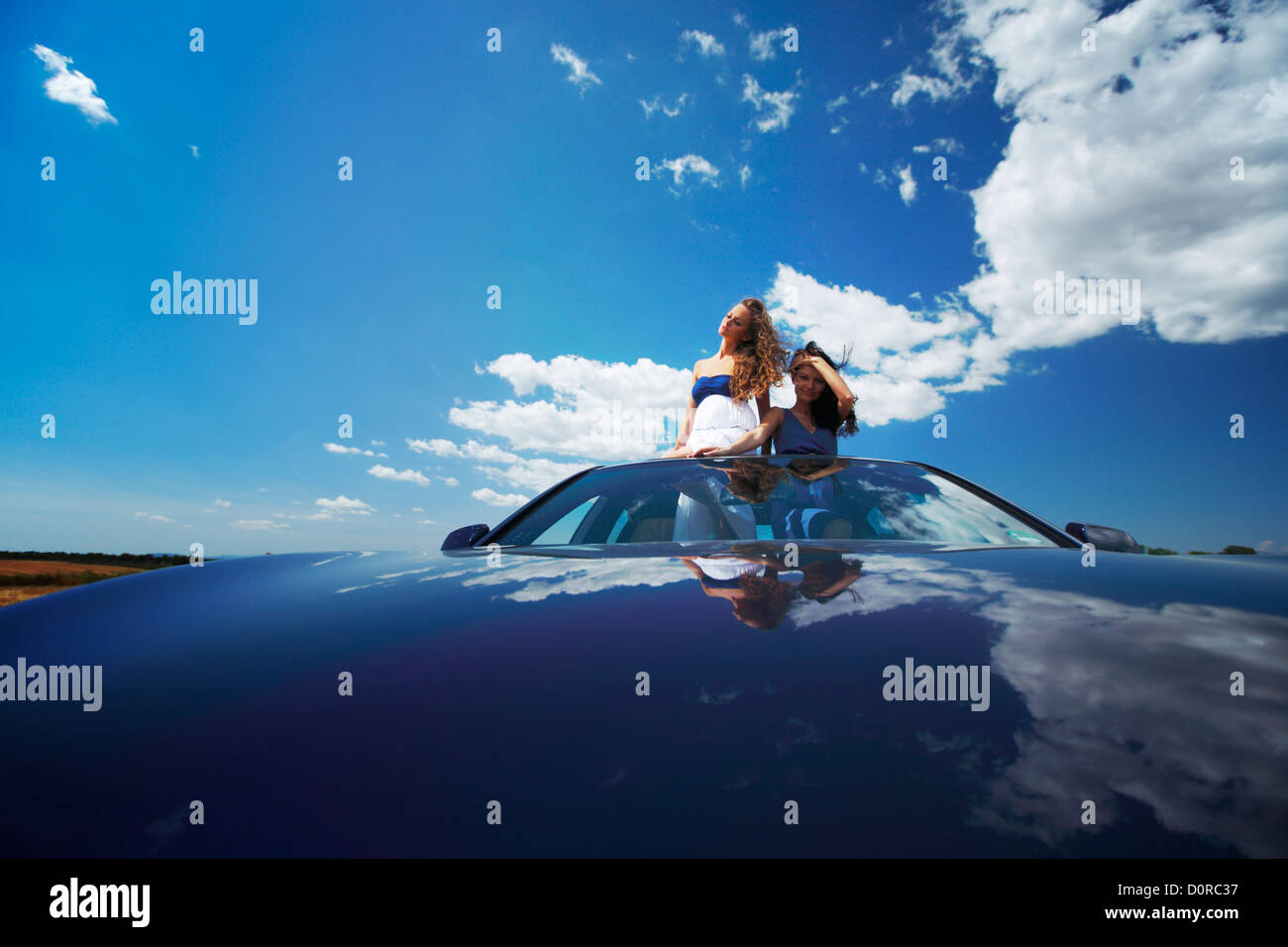 women dance in car Stock Photo - Alamy