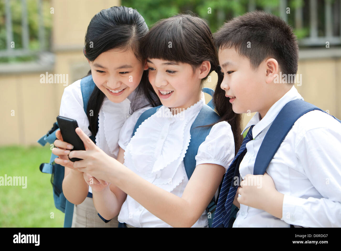 Uniform school smart phone close up hi-res stock photography and images ...