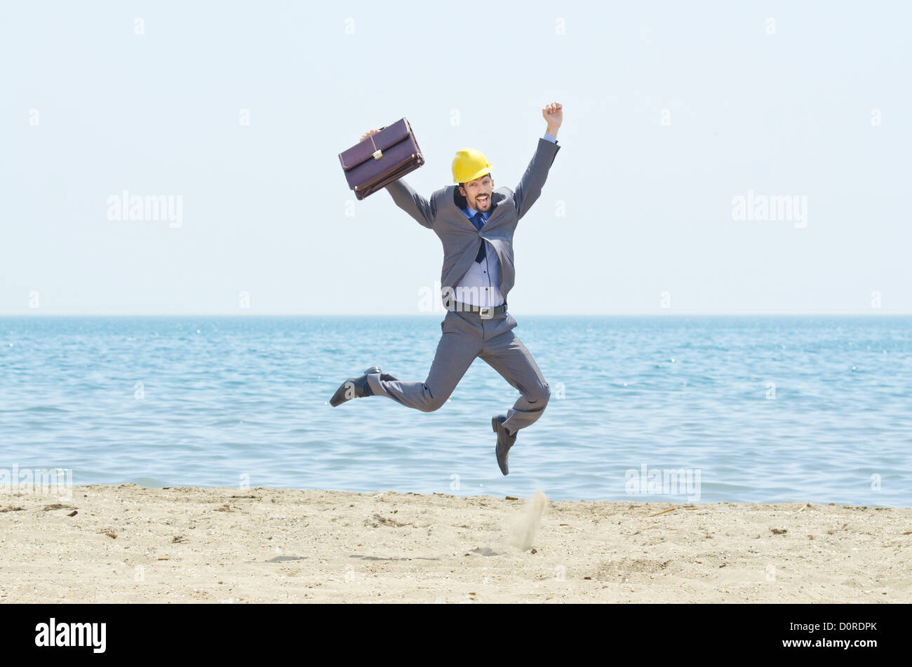 Oil engineer on sea side beach Stock Photo - Alamy