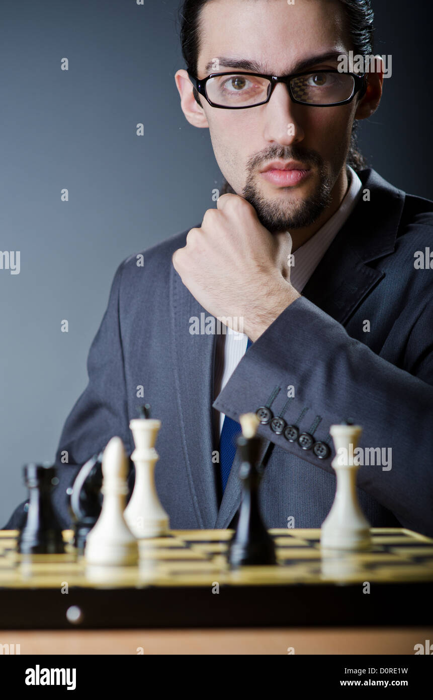 Chess player playing his game Stock Photo - Alamy