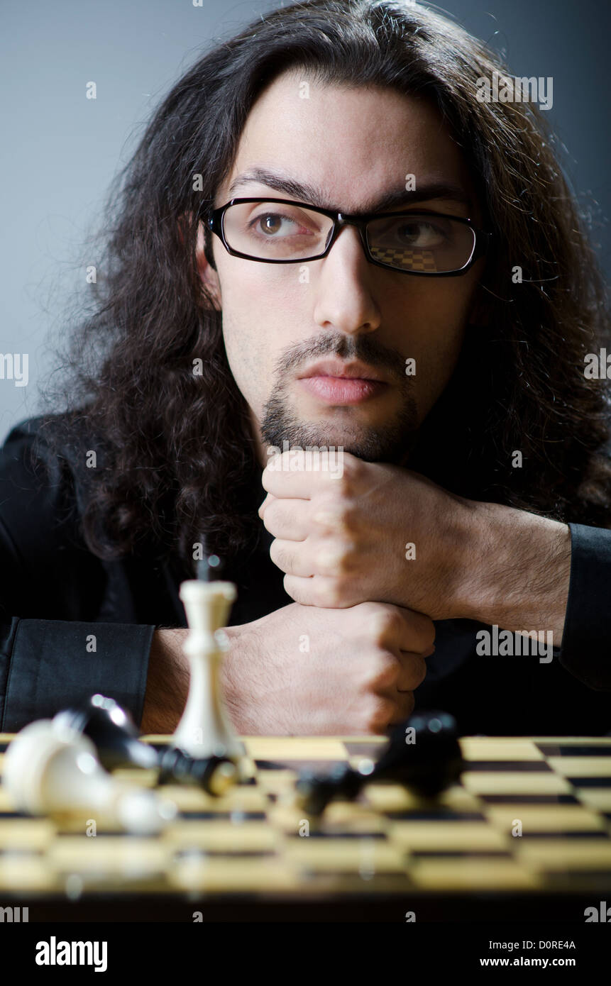 Chess player playing his game Stock Photo - Alamy