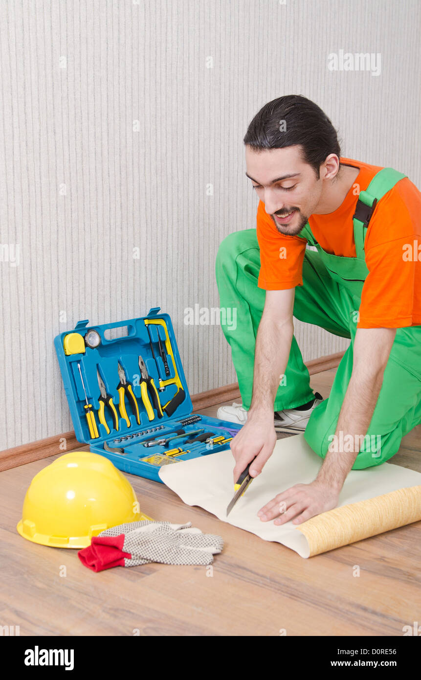 Worker working on the renovation Stock Photo - Alamy