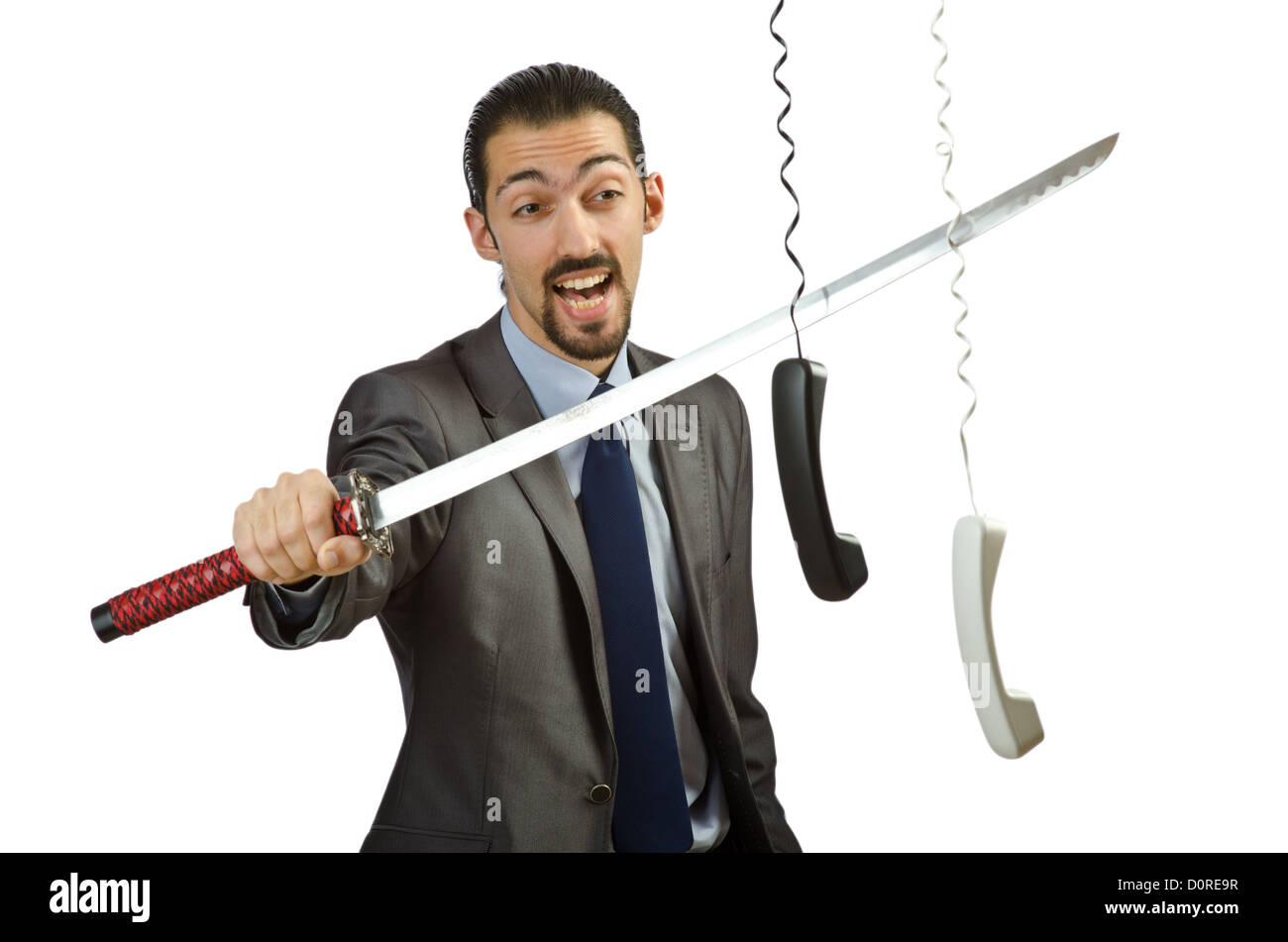 Angry businessman cutting the phone cable Stock Photo - Alamy
