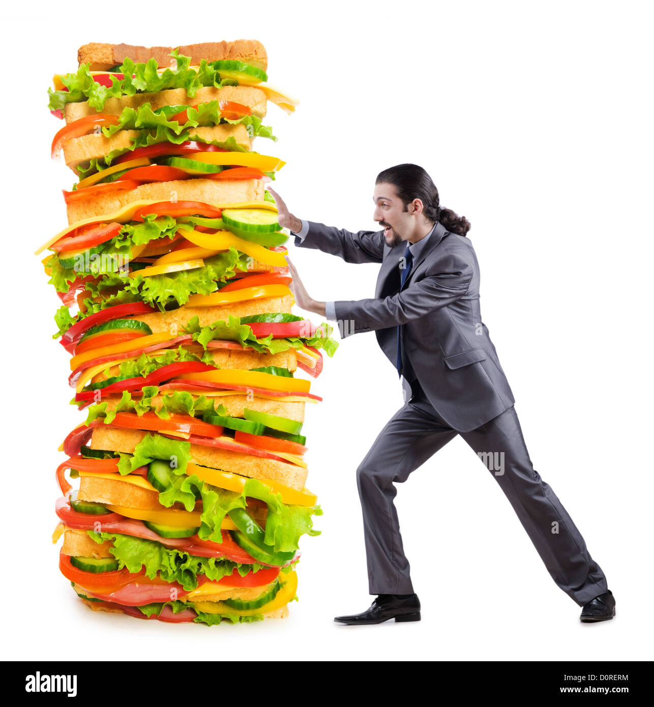 Man and giant sandwich on white Stock Photo - Alamy