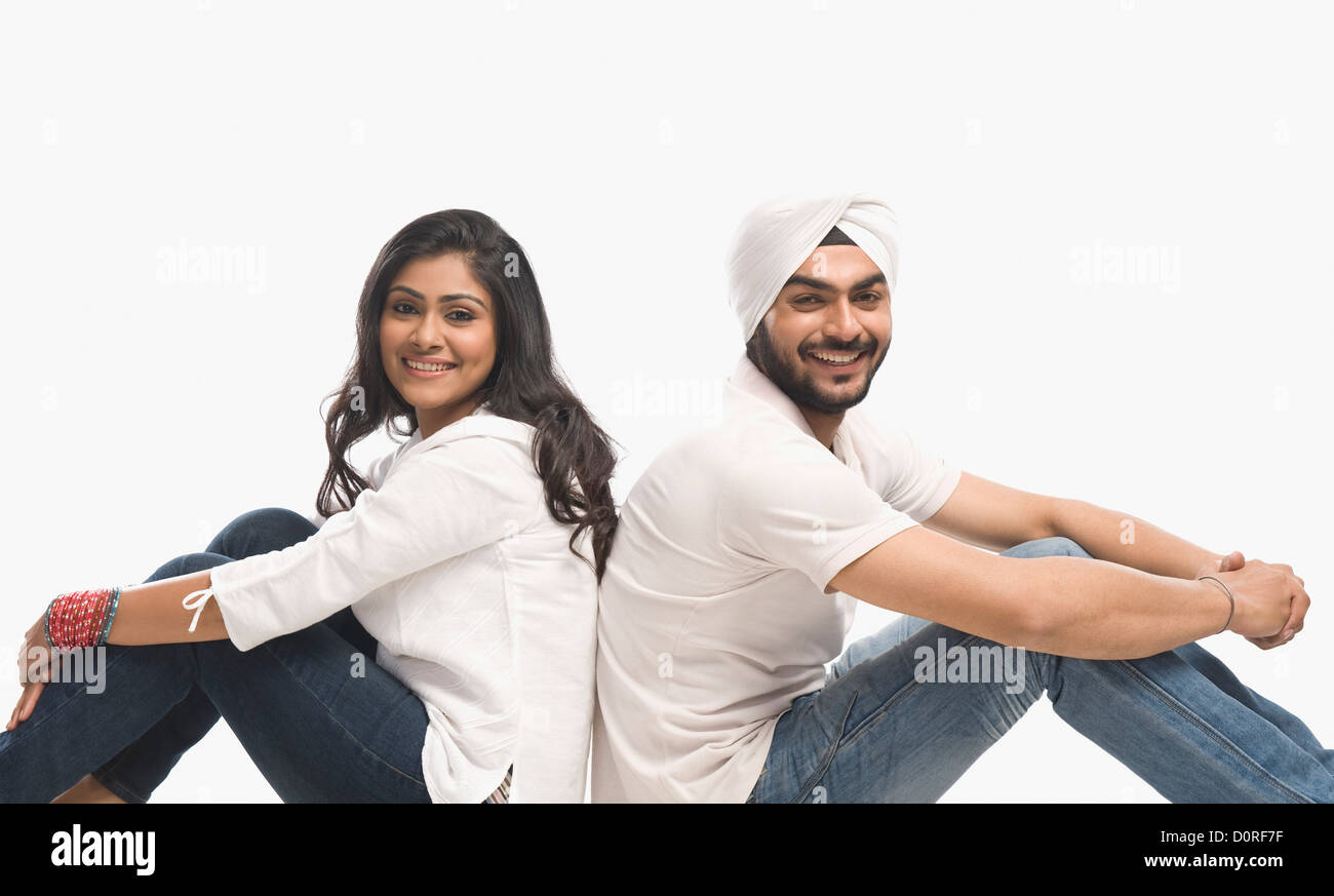 Asian men women sitting Cut Out Stock Images & Pictures - Alamy