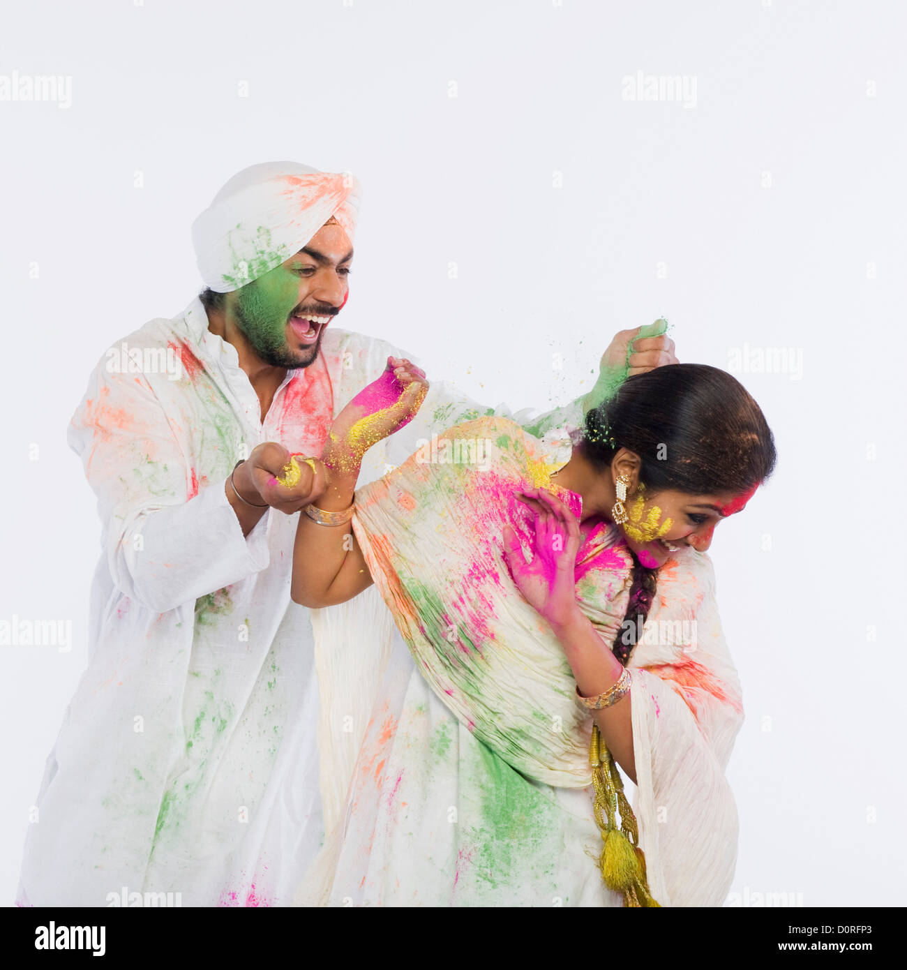 Couple celebrating Holi Stock Photo - Alamy