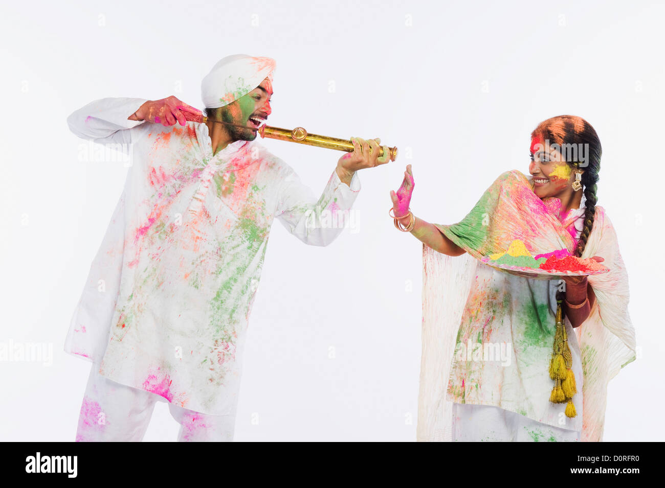 Couple celebrating Holi Stock Photo - Alamy
