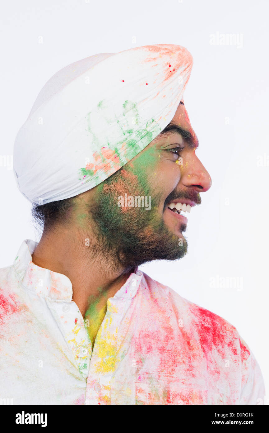 Man celebrating Holi Stock Photo - Alamy