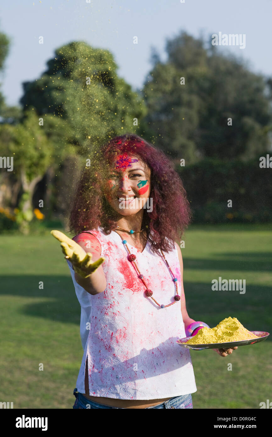 Woman celebrating Holi Stock Photo - Alamy