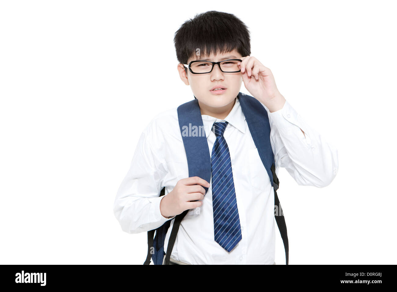 Nearsighted schoolboy having trouble seeing things clearly adjusting ...