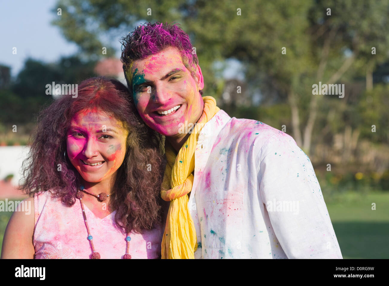 Couple celebrating Holi Stock Photo - Alamy