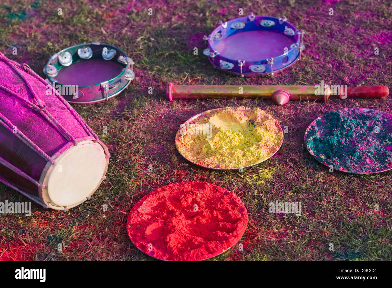 Musical instruments with Holi colors Stock Photo - Alamy